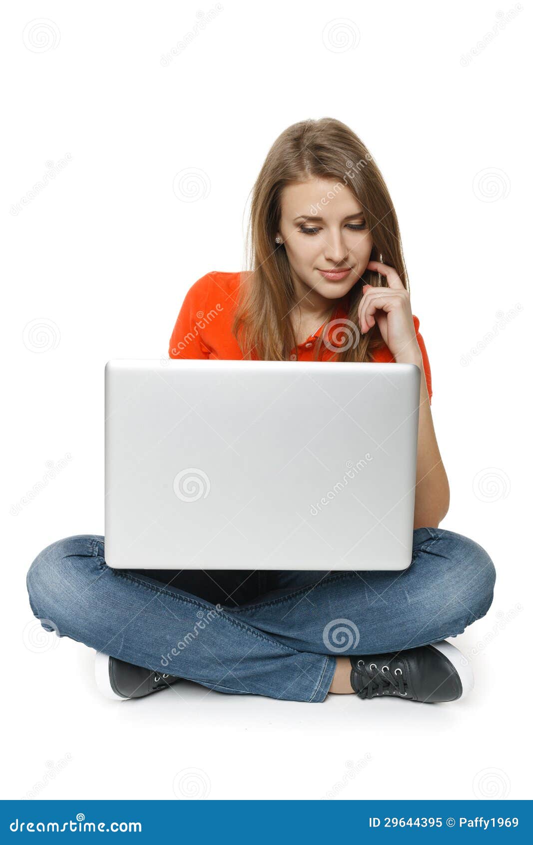 Young Woman Sitting on the Floor while Using Her Laptop Stock Image ...
