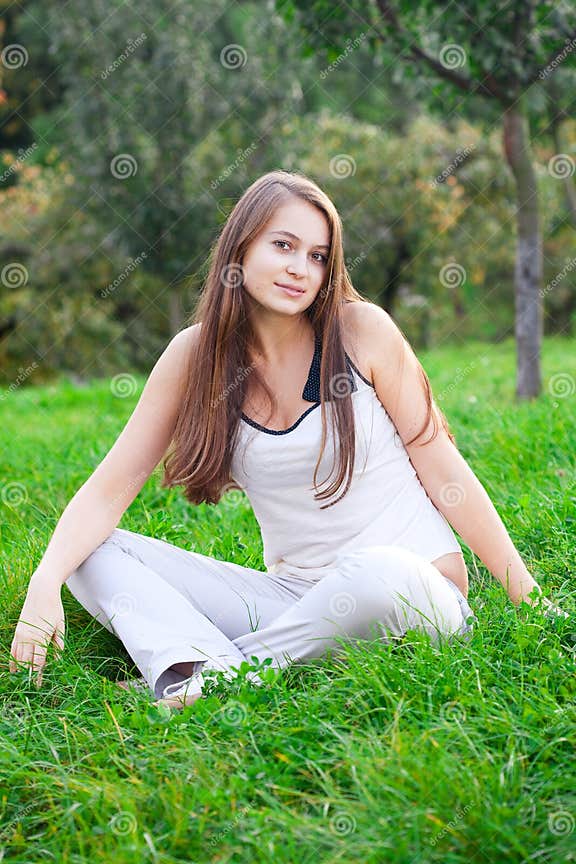 Young Woman Sitting On Green Grass Stock Image Image Of Nature