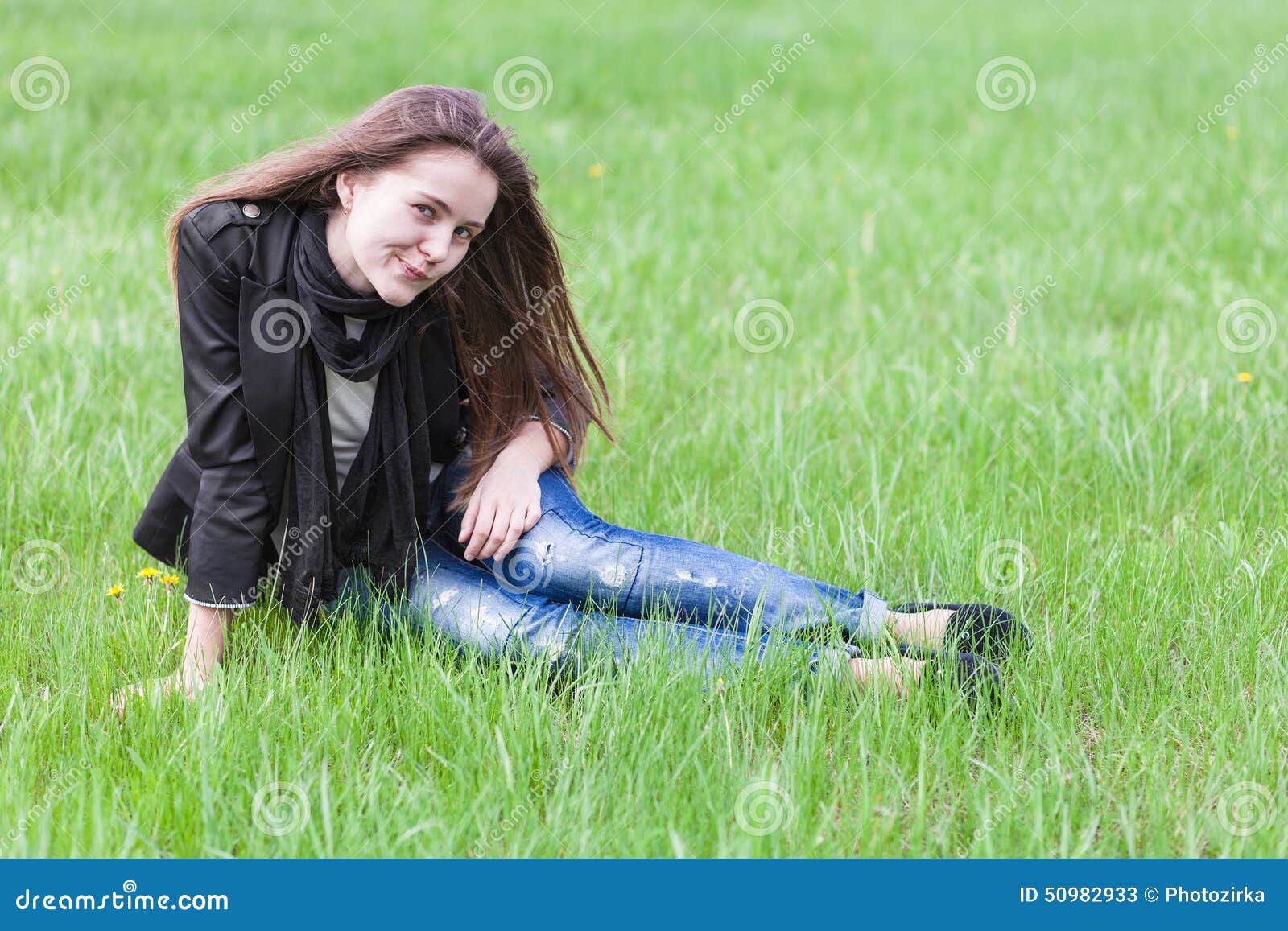 Young Woman Sitting on Lawn Stock Image - Image of lifestyle, carefree ...