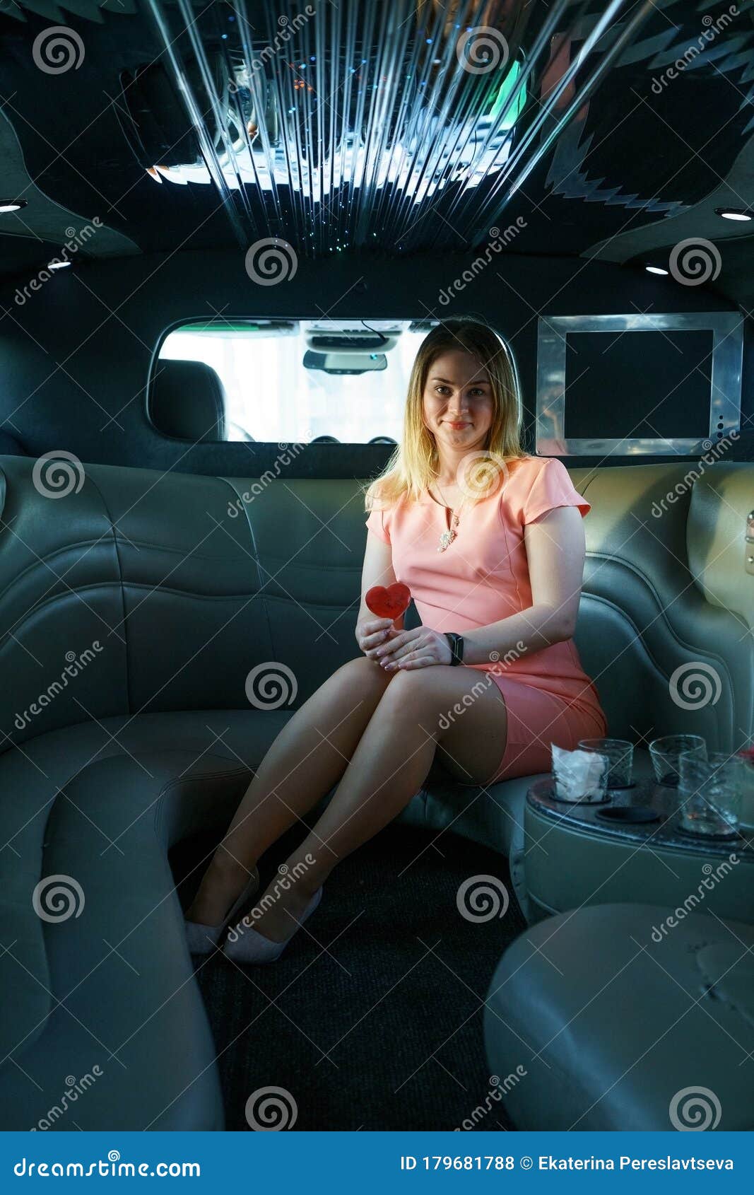 A Young Woman is Sitting in a Limousine Stock Photo - Image of female ...