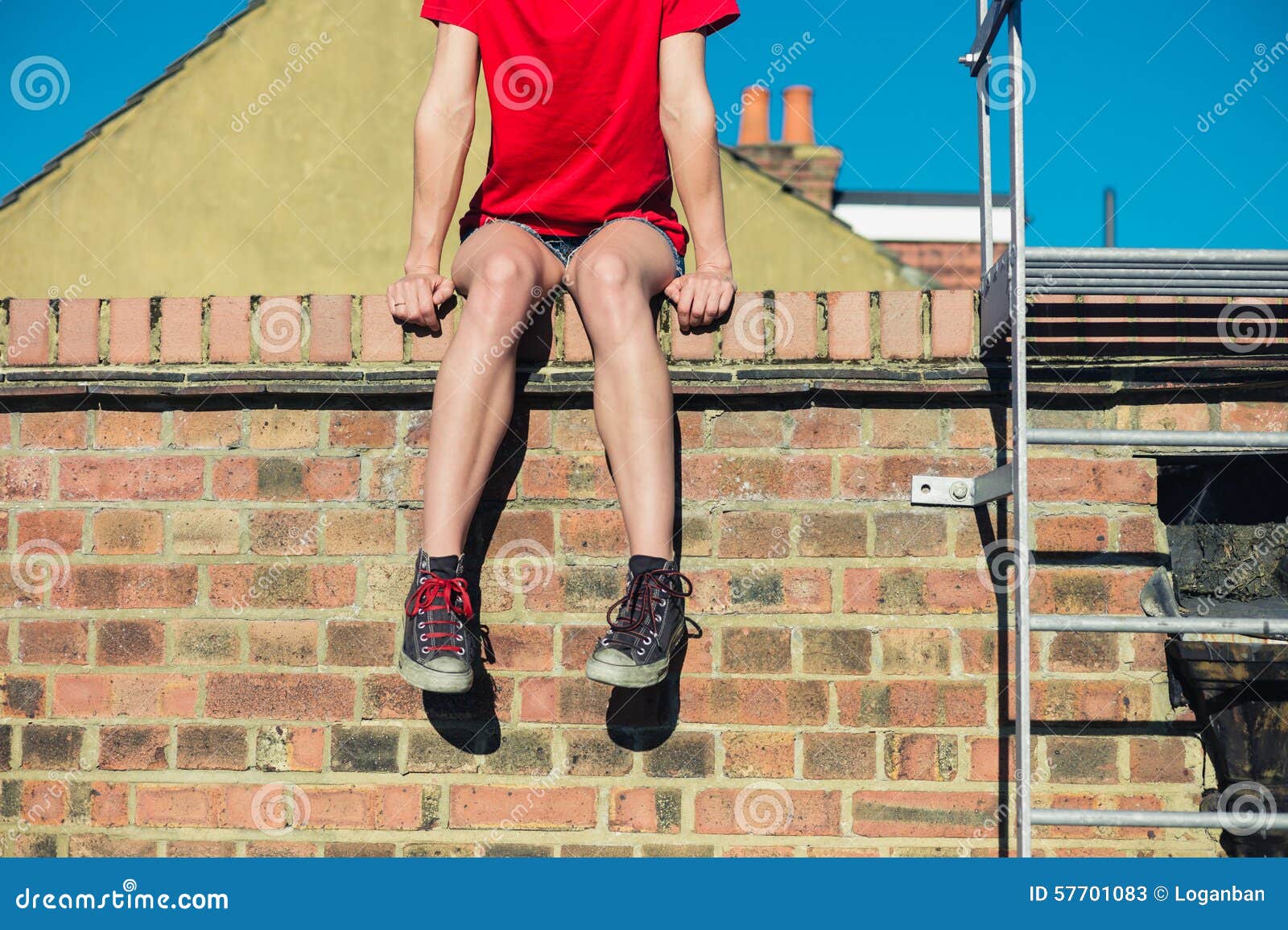 Young Woman Sitting on a Roof Stock Image - Image of person, outside ...