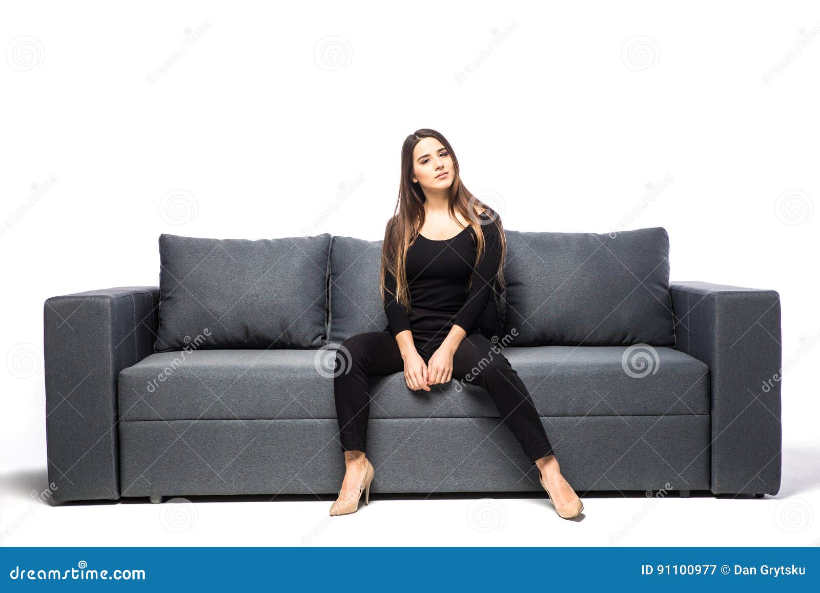 Young Woman Sitting on Sofa on White Background Stock Image - Image of ...