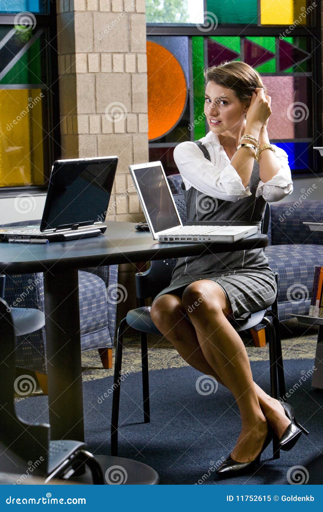 Young Woman Sitting at Table with Laptop Computer Stock Image - Image ...