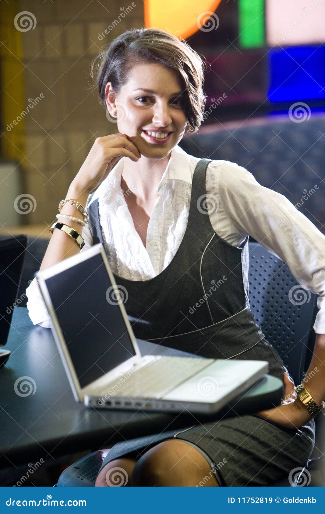 Young Woman Sitting at Table with Laptop Computer Stock Image - Image ...