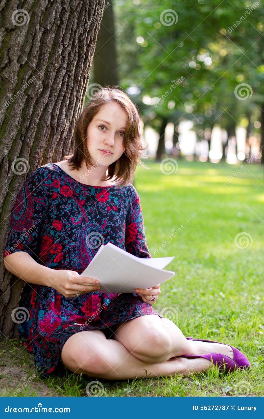 Young Woman Sitting Under a Tree Stock Image - Image of student ...
