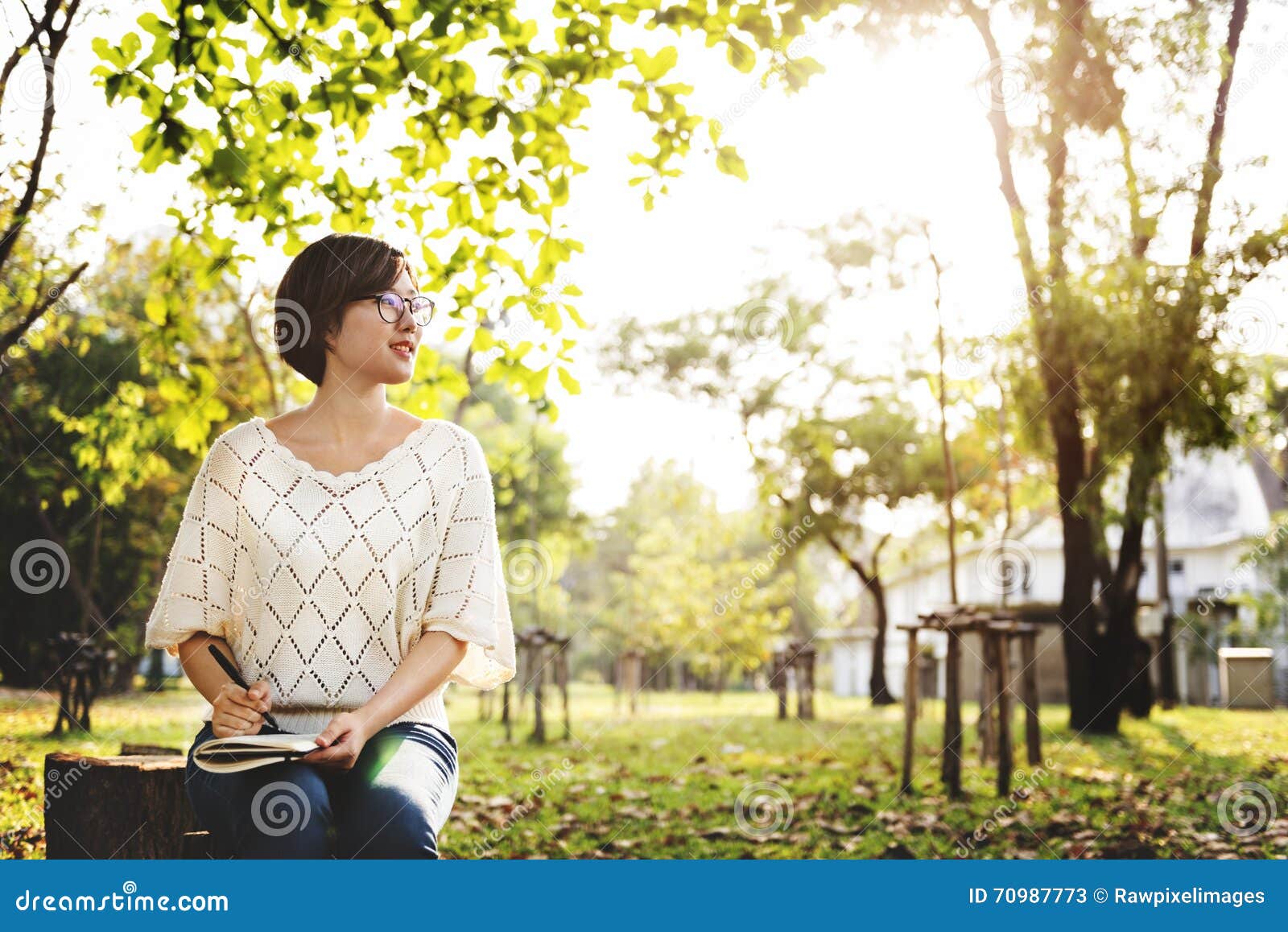 Young Woman Sitting Writing Outside Concept Stock Image - Image of ...