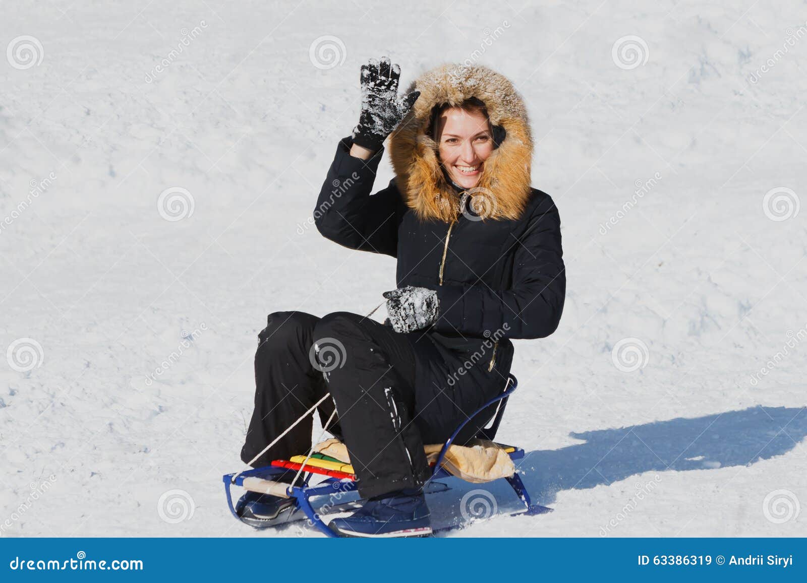 Young woman on a sled stock image. Image of freeze, people - 63386319