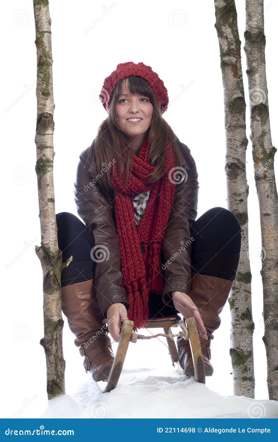 Young woman on a sledge stock photo. Image of brown, woman - 22114698