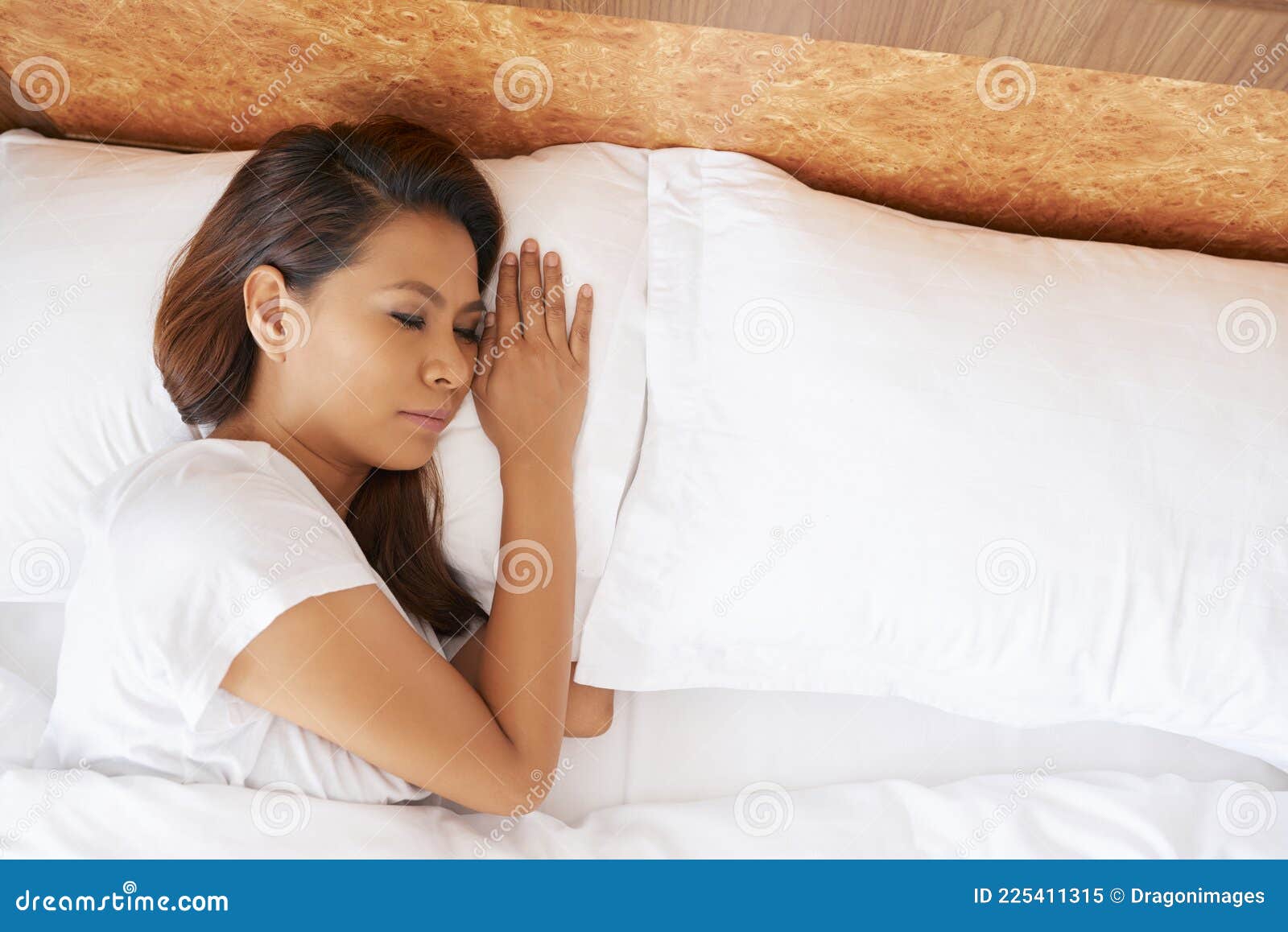 Young Woman Sleeping Alone stock image. Image of morning - 225411315