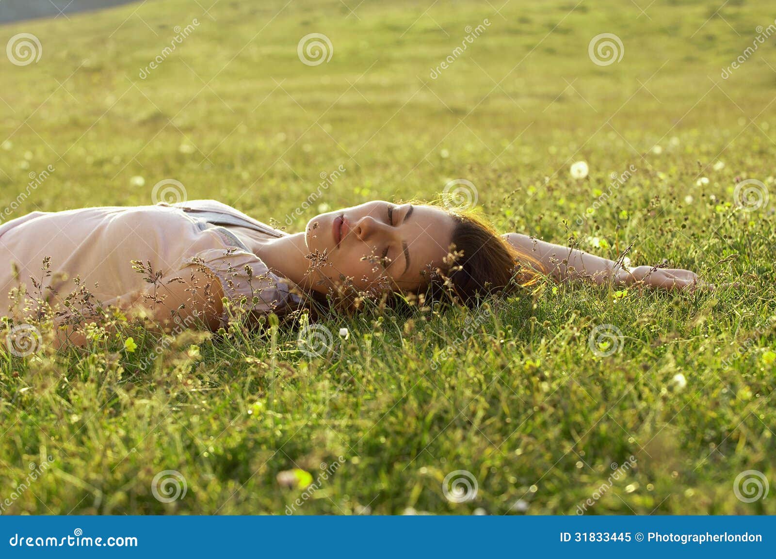 Young Woman Sleeping On Grass At Park Stock Image Image Of Calm