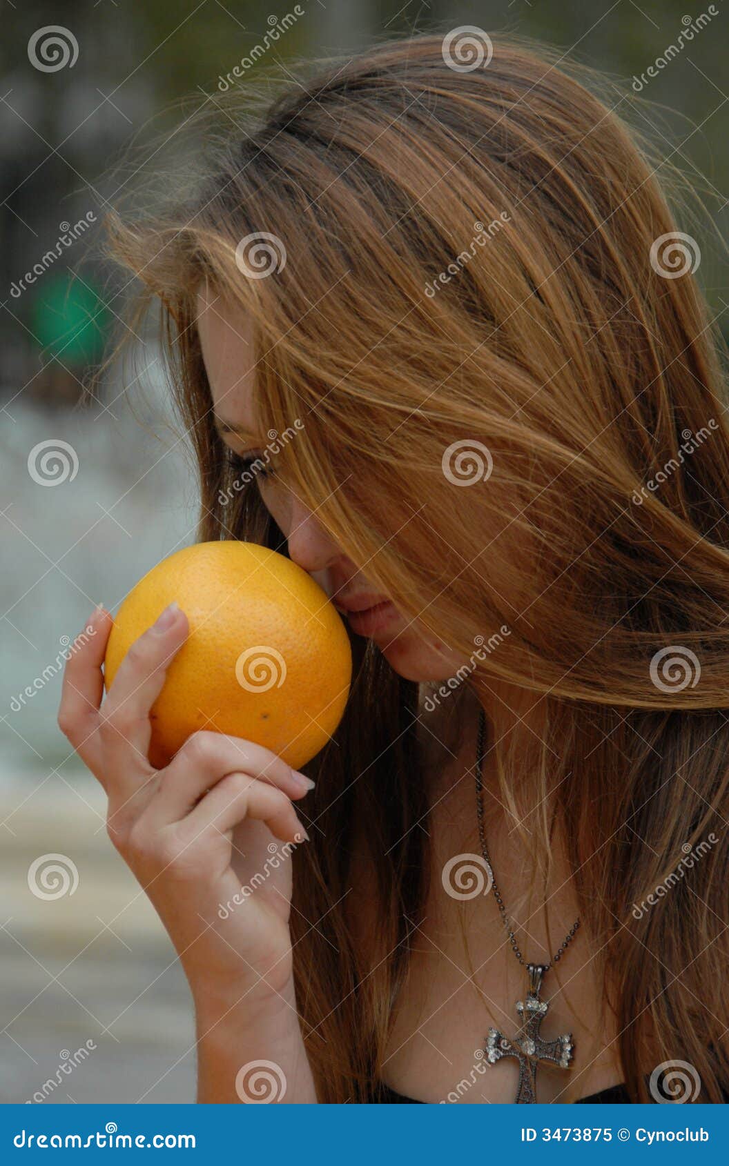 Young woman smell a fruit stock image. Image of fruit - 3473875