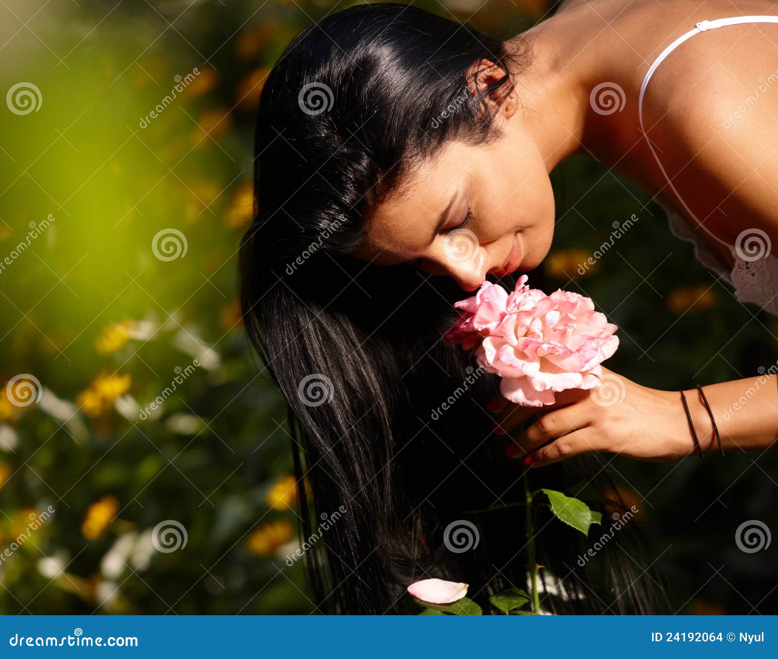 Young Woman Smelling Flower Stock Photo - Image of female, good: 24192064