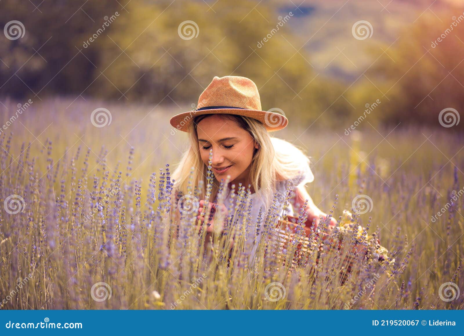 Young Woman Smelling Lavender Stock Image - Image of harmony, carefree ...