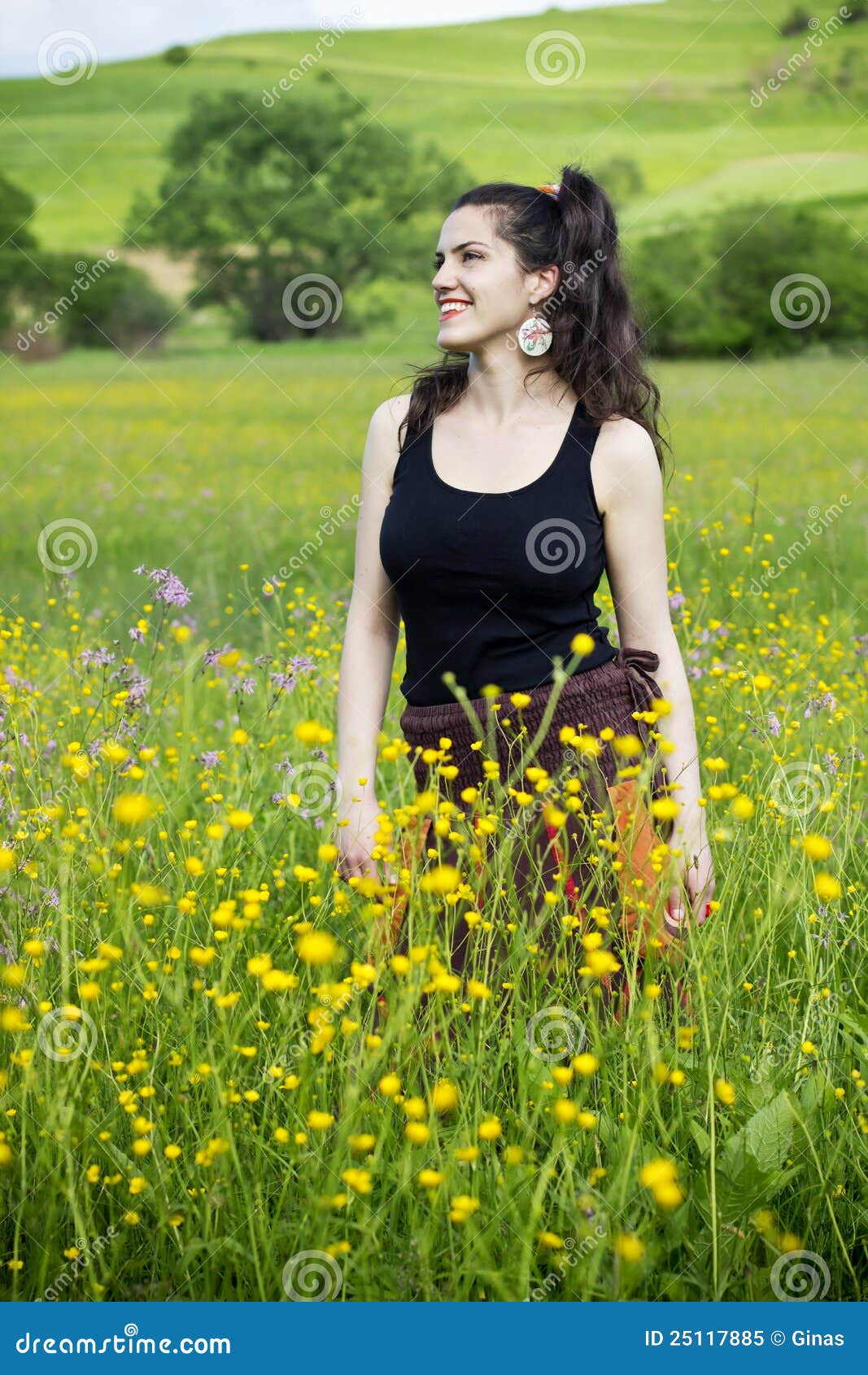 Young Woman Smiling in a Field of Flowers Stock Image - Image of ...