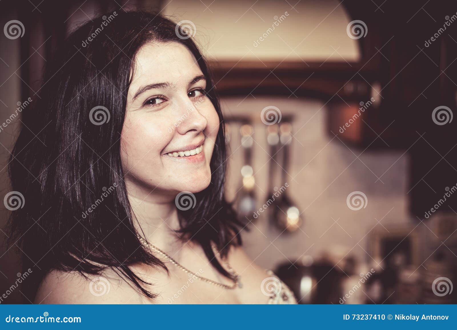 Young Woman Smiling in the Kitchen Portrait Stock Photo - Image of ...