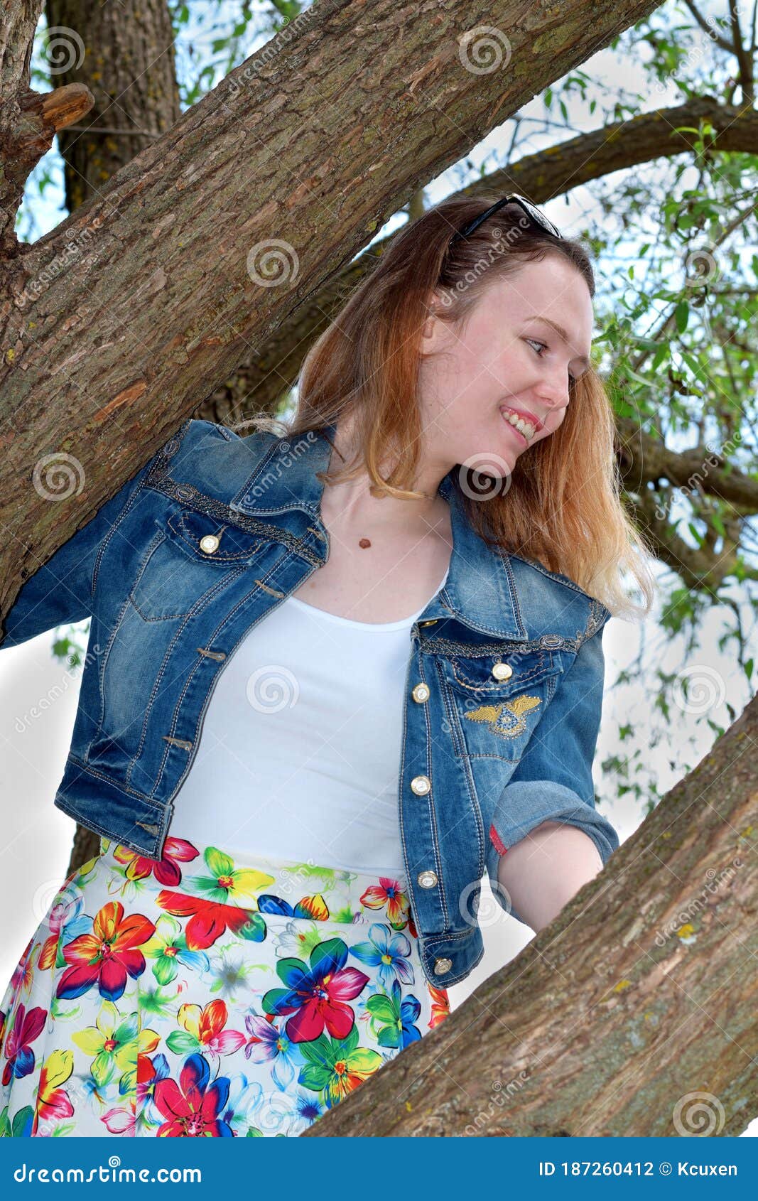 Woman is Smiling and Posing on the Tree Stock Photo - Image of mood ...