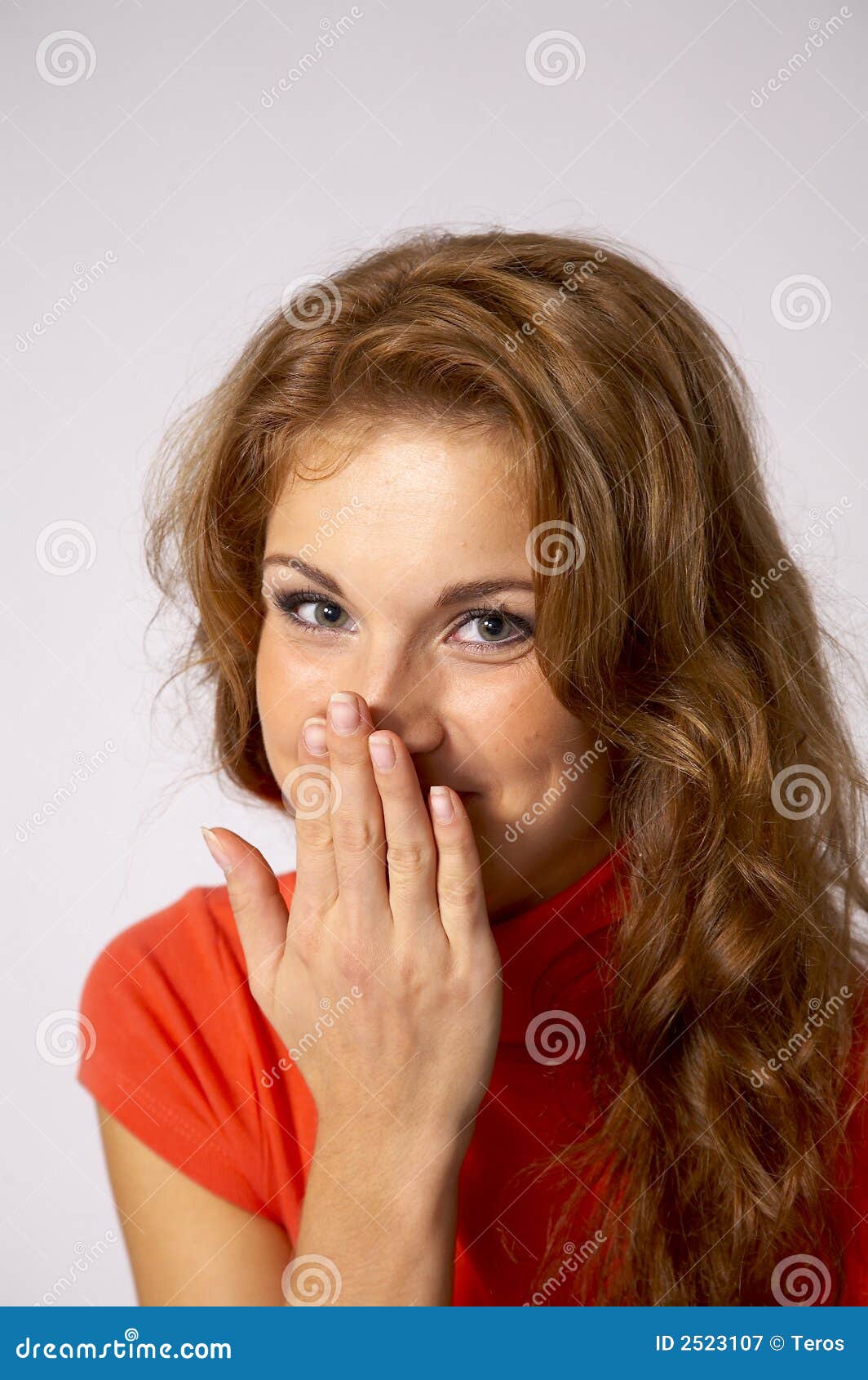 Young woman smiling shyly stock image. Image of single - 2523107