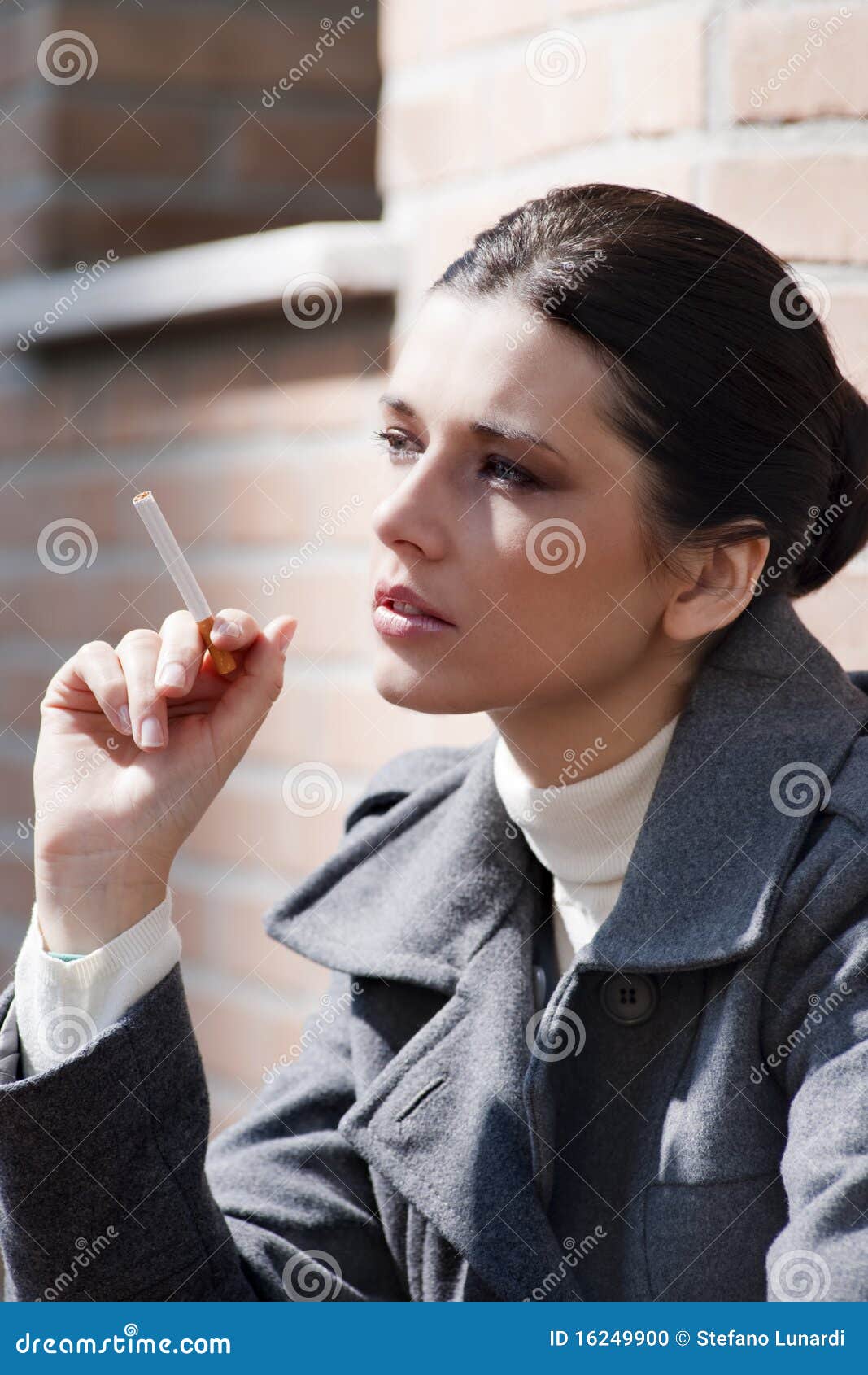 Young Woman Smoking Outside Stock Photo - Image of color, vertical ...