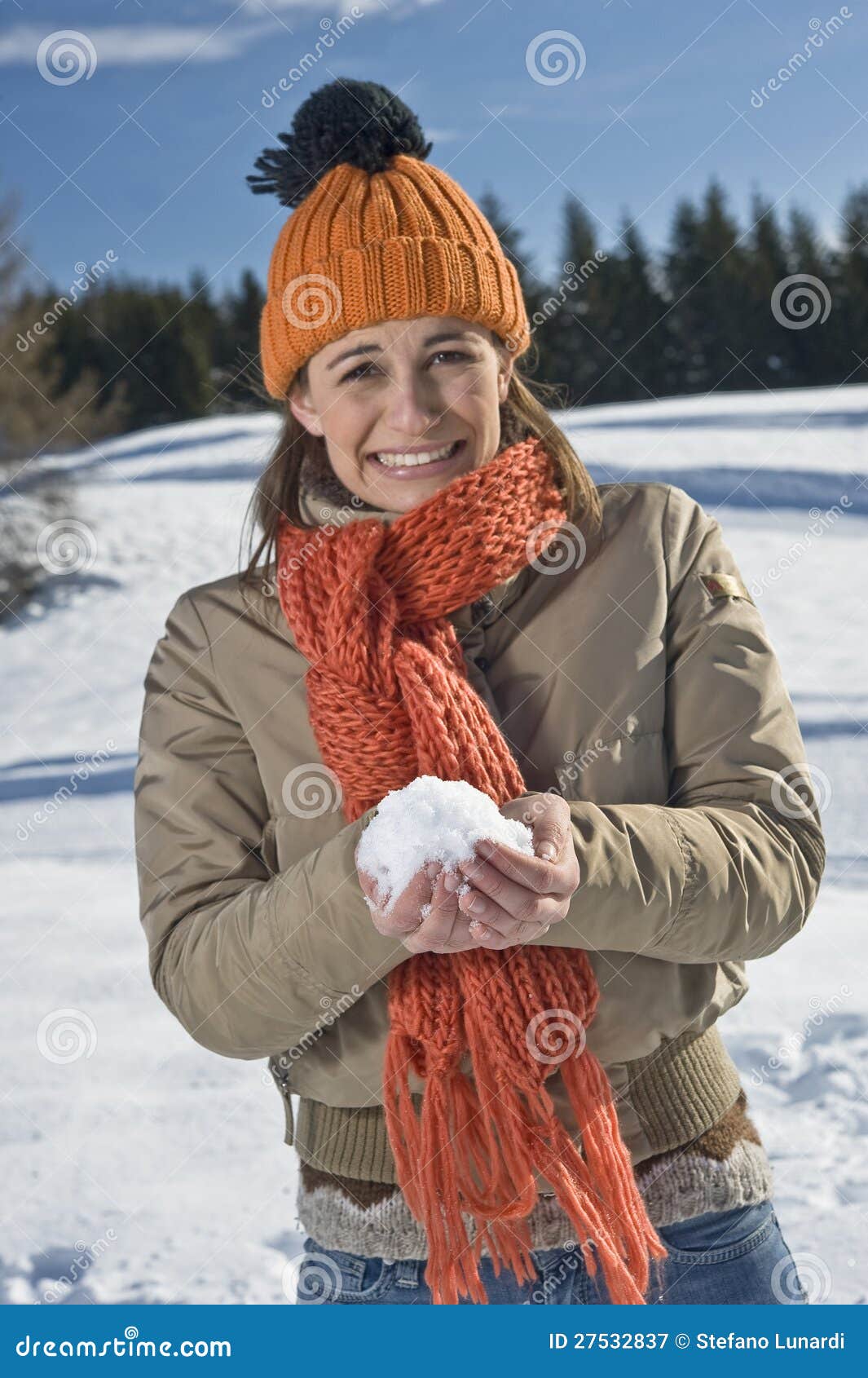 Young woman with snow ball stock image. Image of mountain - 27532837