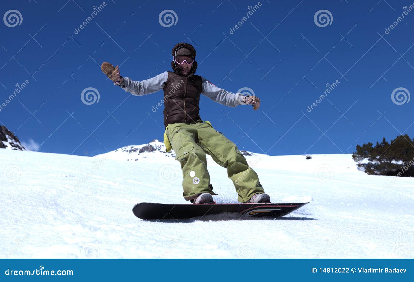 Young woman on a snowboard stock photo. Image of sport - 14812022