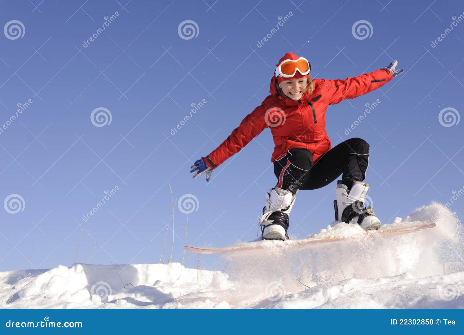 Young woman on snowboard stock photo. Image of person - 22302850