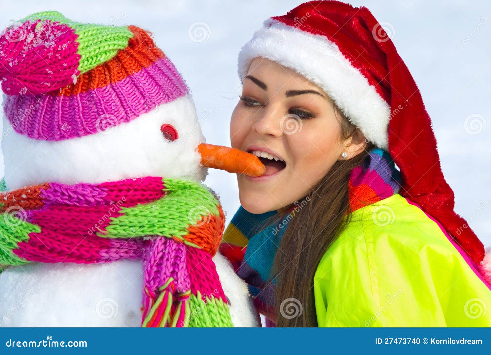Young woman with a snowman stock photo. Image of casual - 27473740