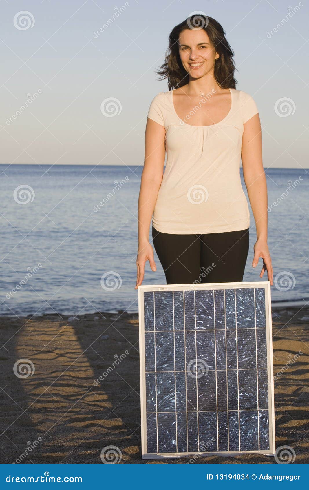Young Woman with a Solar Panel Stock Photo - Image of protective ...