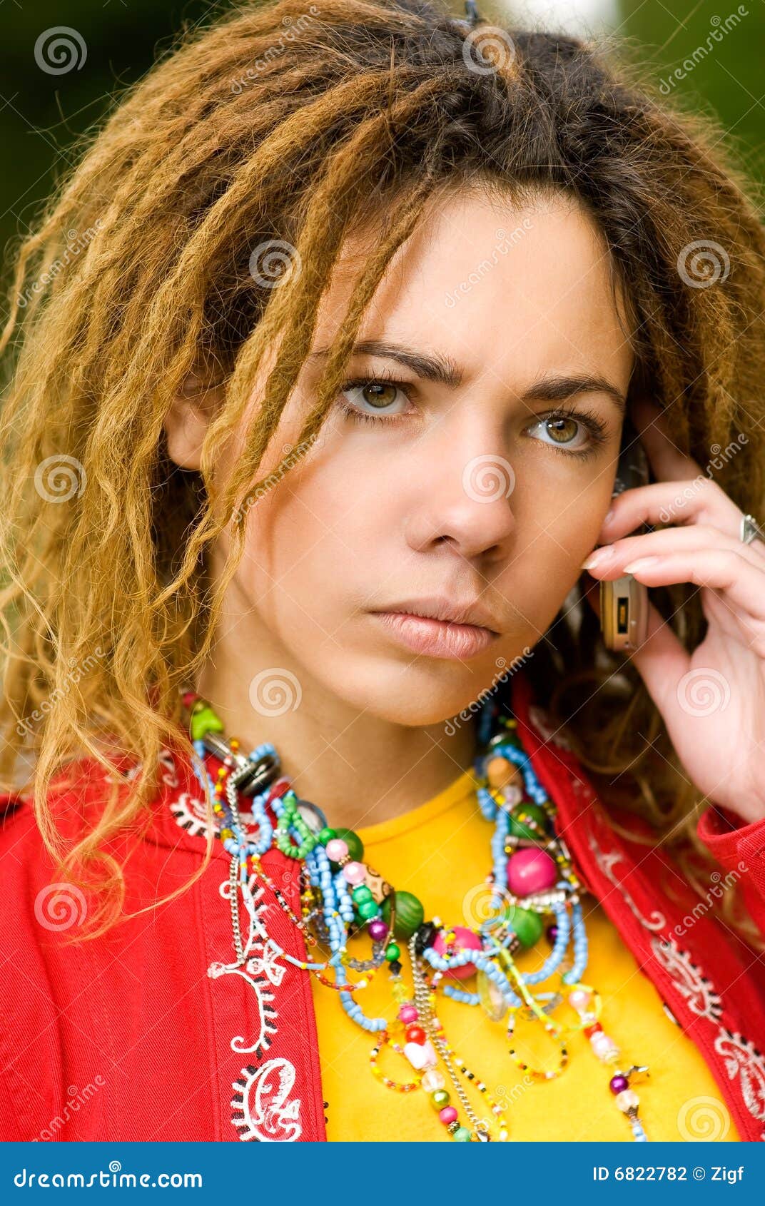 Young Woman Speaks on Phone with Dreadlocks Stock Photo - Image of ...