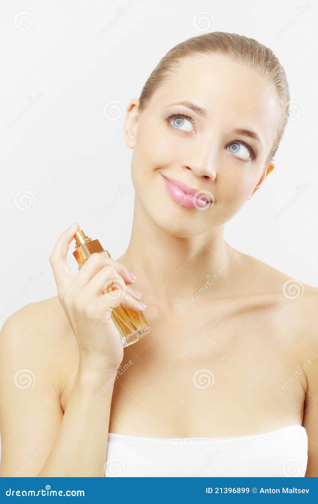 Young Woman Spraying Perfume Stock Image - Image of enjoying, neck ...