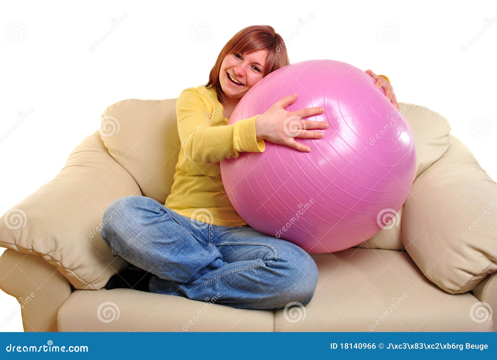 Young Woman with a Stability Ball on a Couch Stock Photo - Image of ...