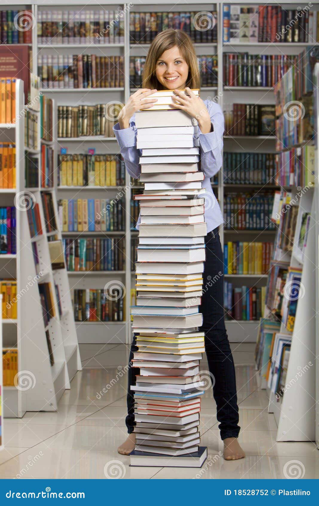Young Woman Standing with Big Stack of Books Stock Photo - Image of ...