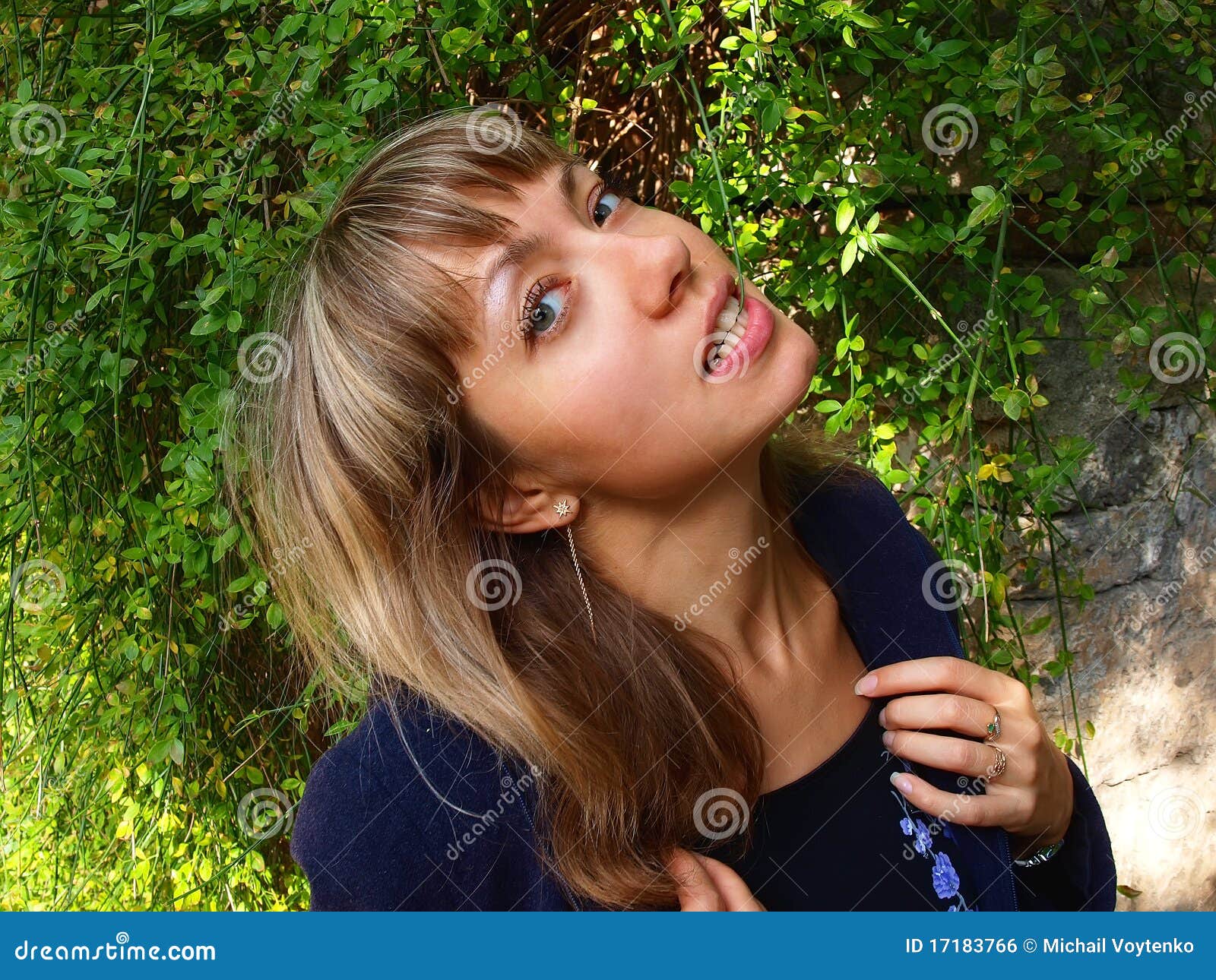 Young Woman Standing in a Bushes Stock Photo - Image of caucasian ...