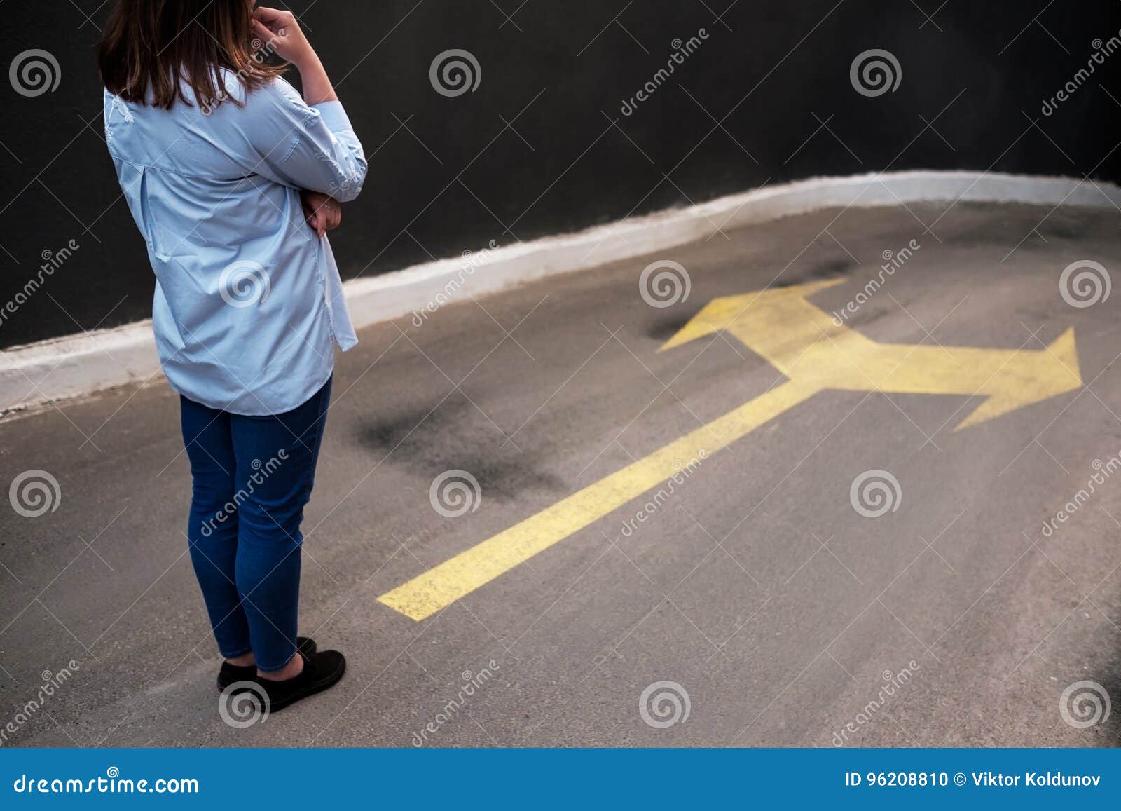 Young Woman Standing in Front of Two Roads Stock Photo - Image of ...