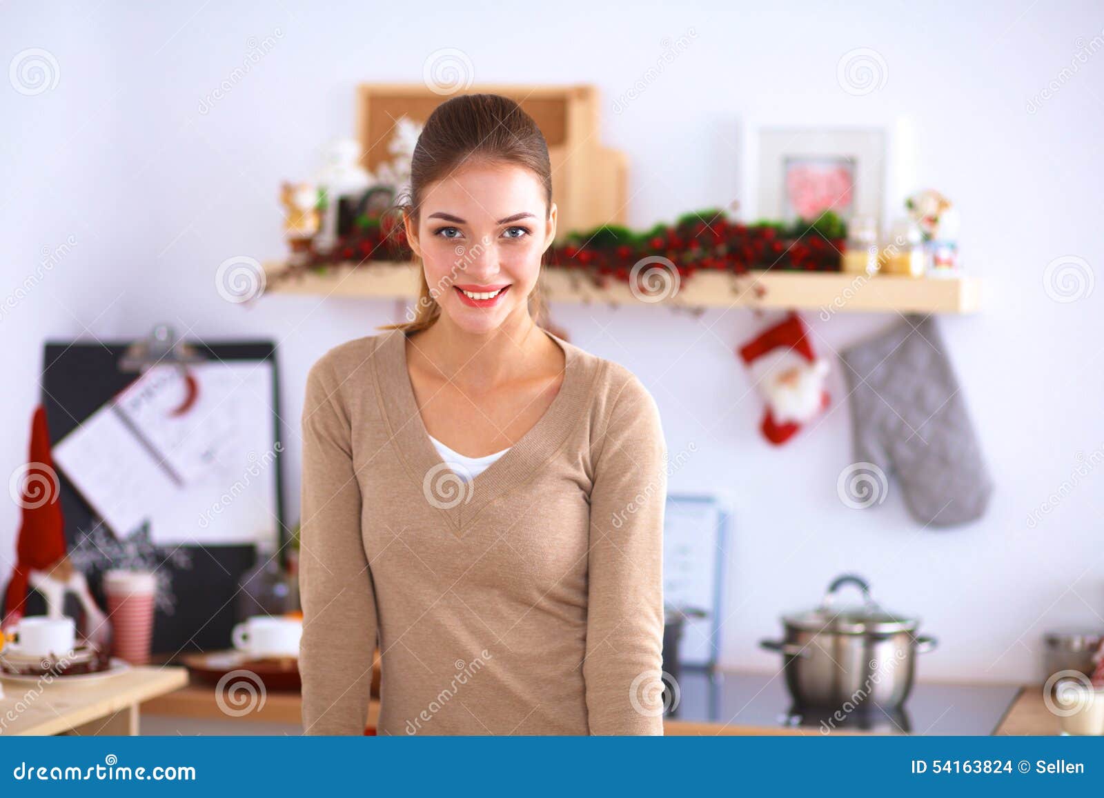 Young Woman Standing in Her Kitchen Stock Photo - Image of cabinet ...