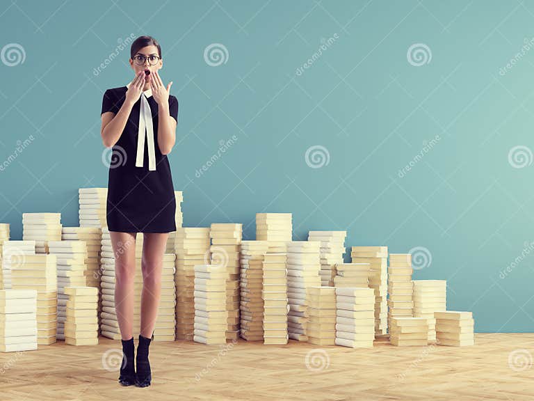 Young Woman Standing Infront of Stack Books. Education Concept. Stock ...