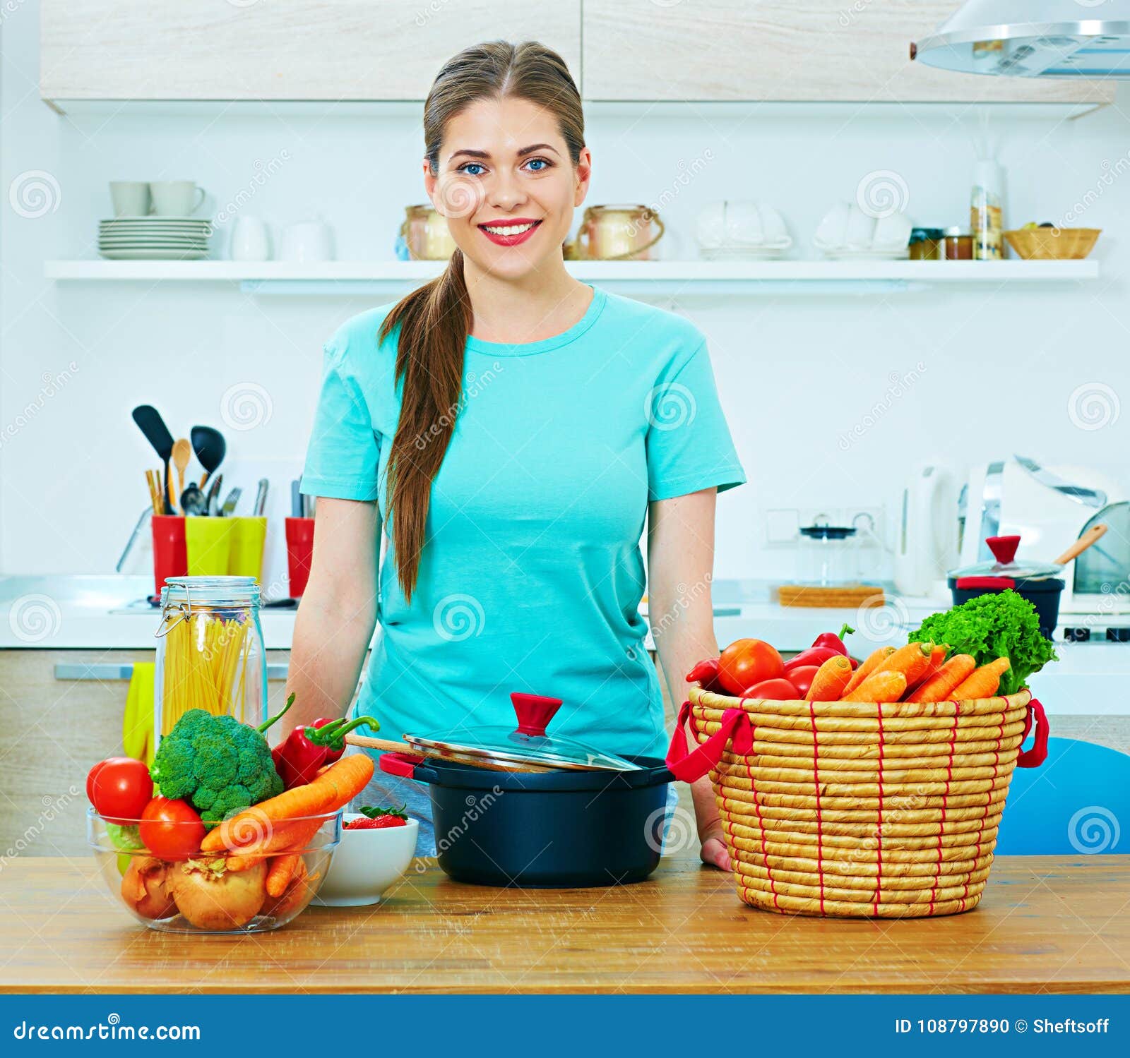 Young Woman Standing in Kitchen. Stock Photo - Image of health, pasta ...