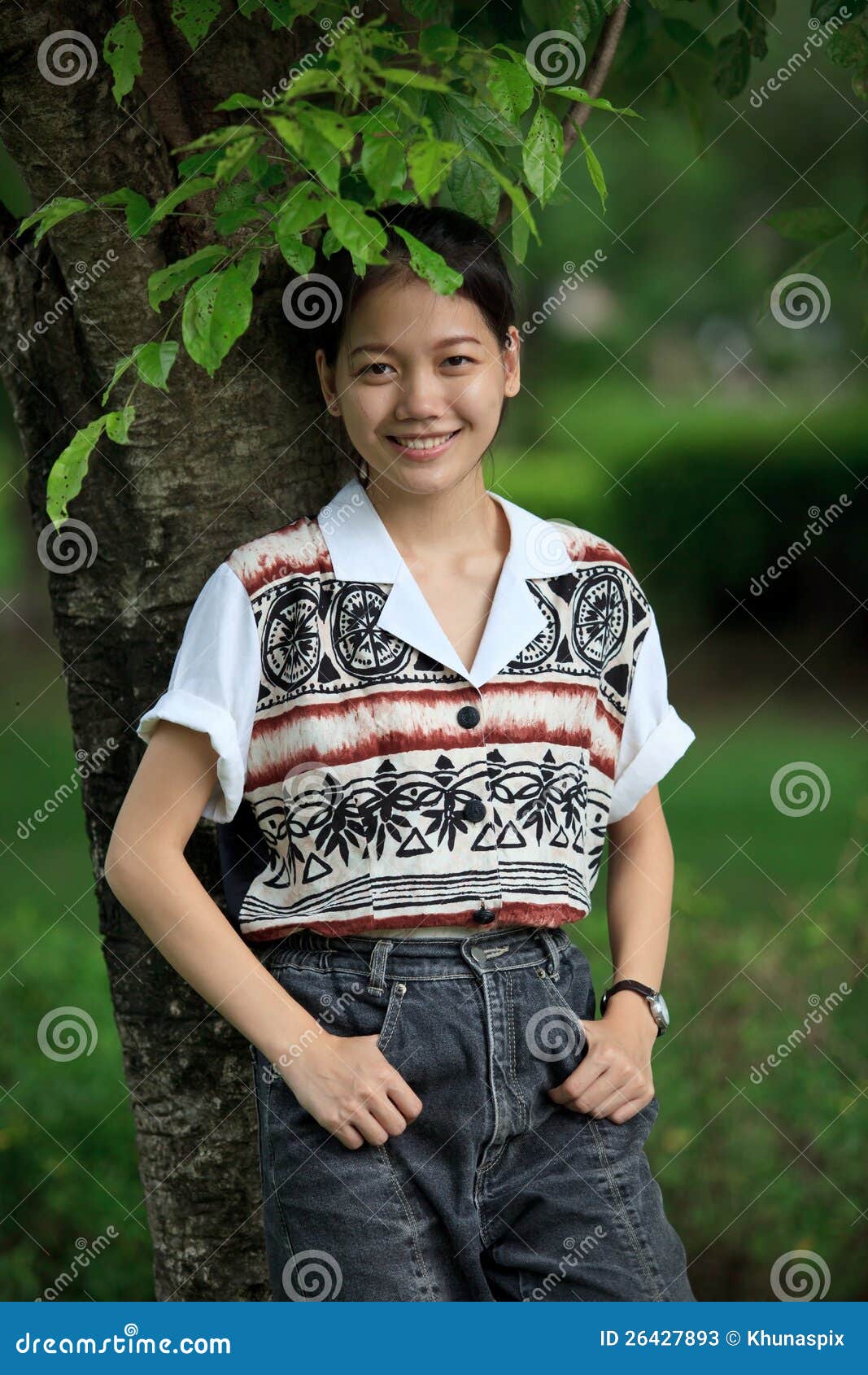 Young Woman Standing Near Tree in the Park with Ni Stock Image - Image ...