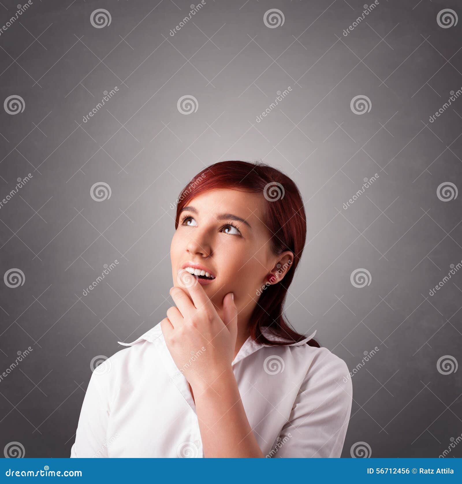 Young Woman Standing and Thinking with Copy Space Stock Photo - Image ...