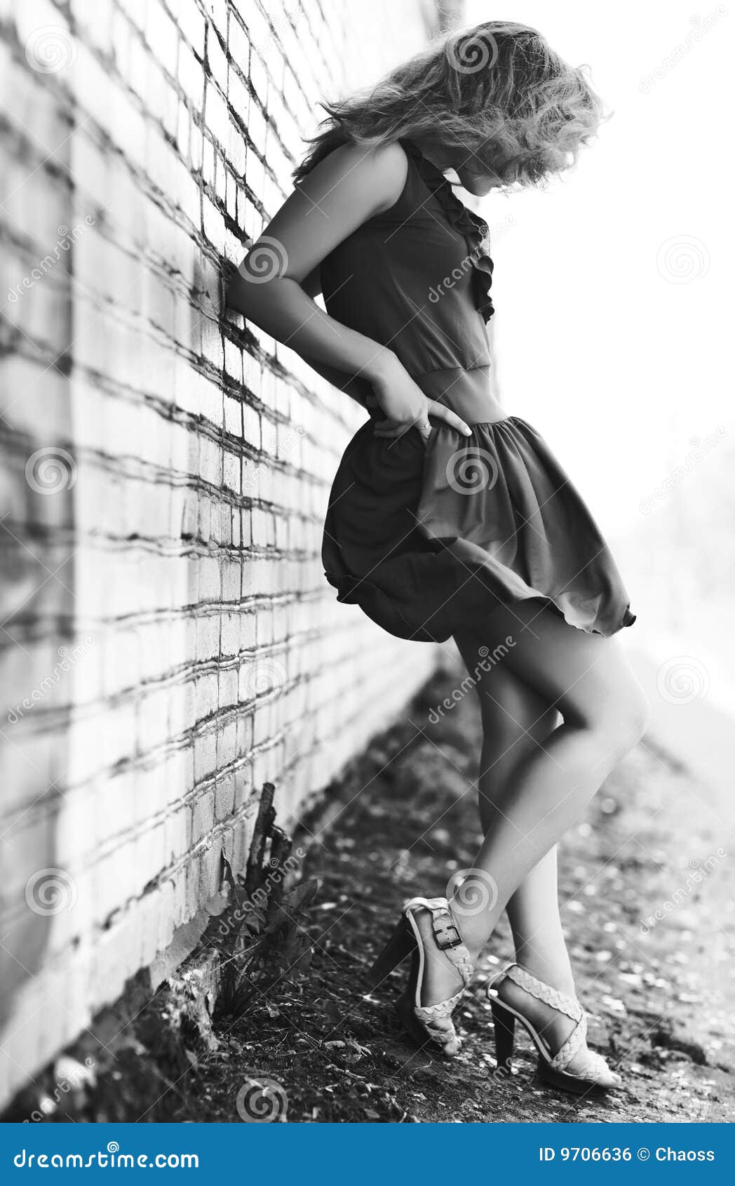 Young Woman Standing at the Wall Stock Photo - Image of white, urban ...