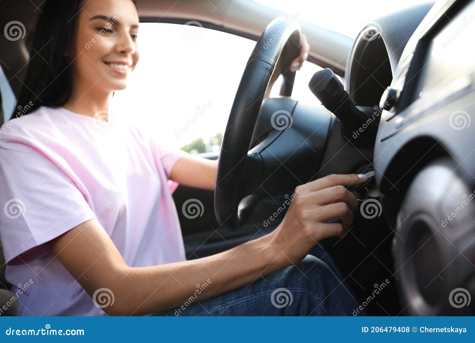 Young Woman Starting Engine of Car. Driving School Stock Photo - Image ...