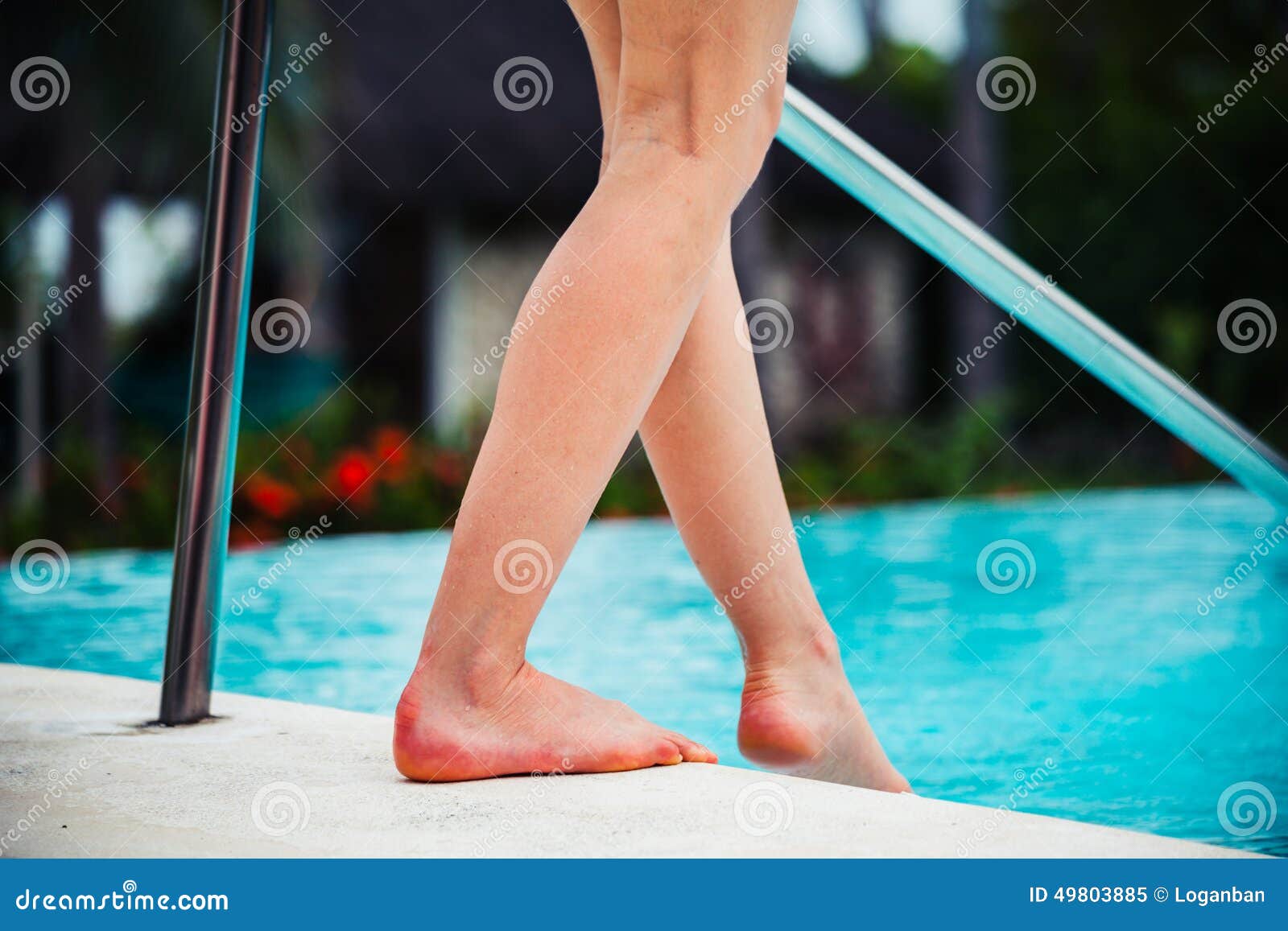 Young Woman Stepping into Swimming Pool Stock Image - Image of summer ...