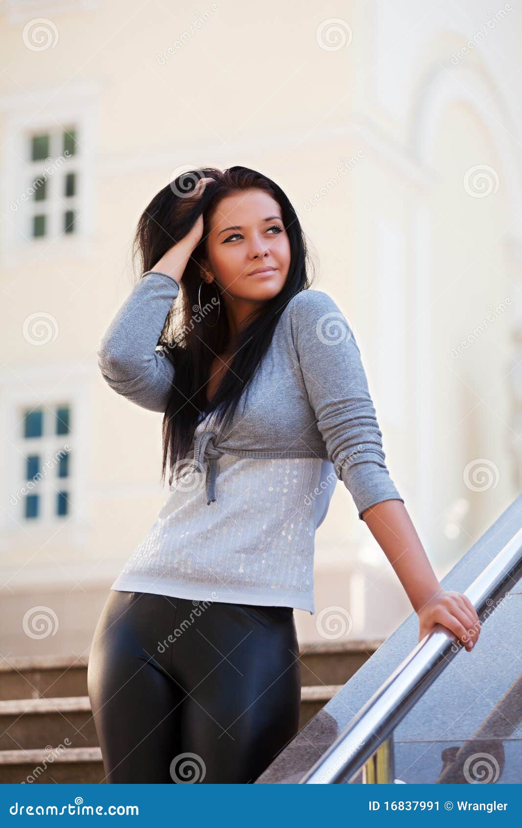 Young woman on the steps. stock image. Image of female - 16837991