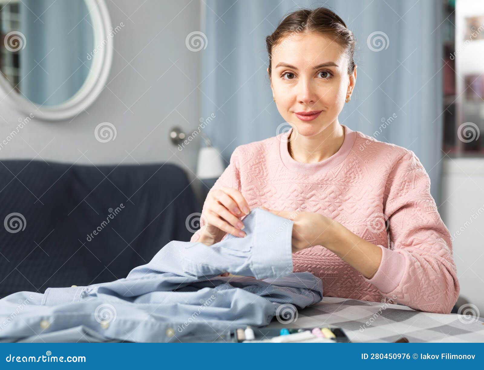 Young Woman Stitching Clothes at Home Stock Photo - Image of person ...