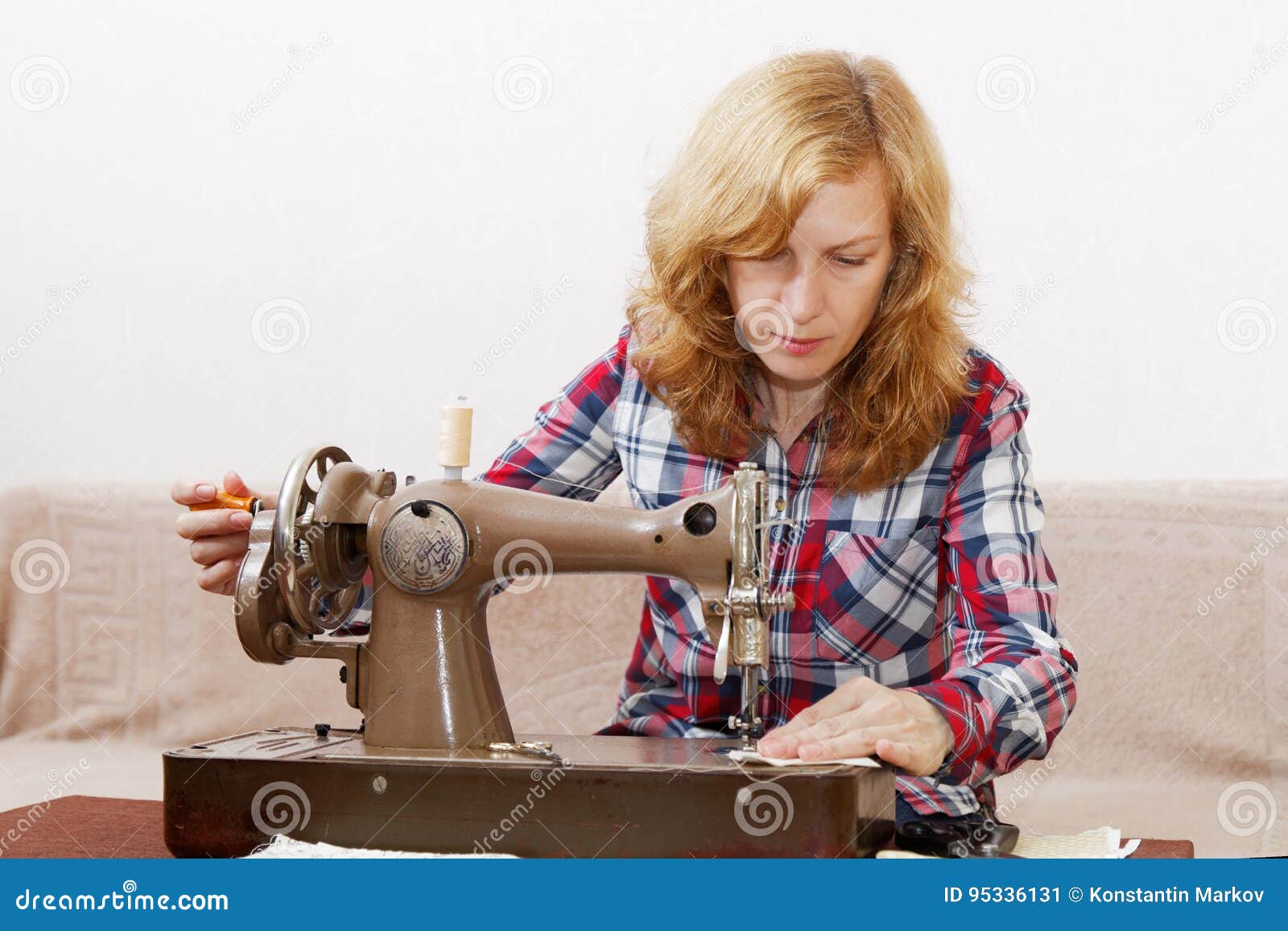 Young Woman Stitching Fabric Using a Sewing Machine Stock Image - Image ...