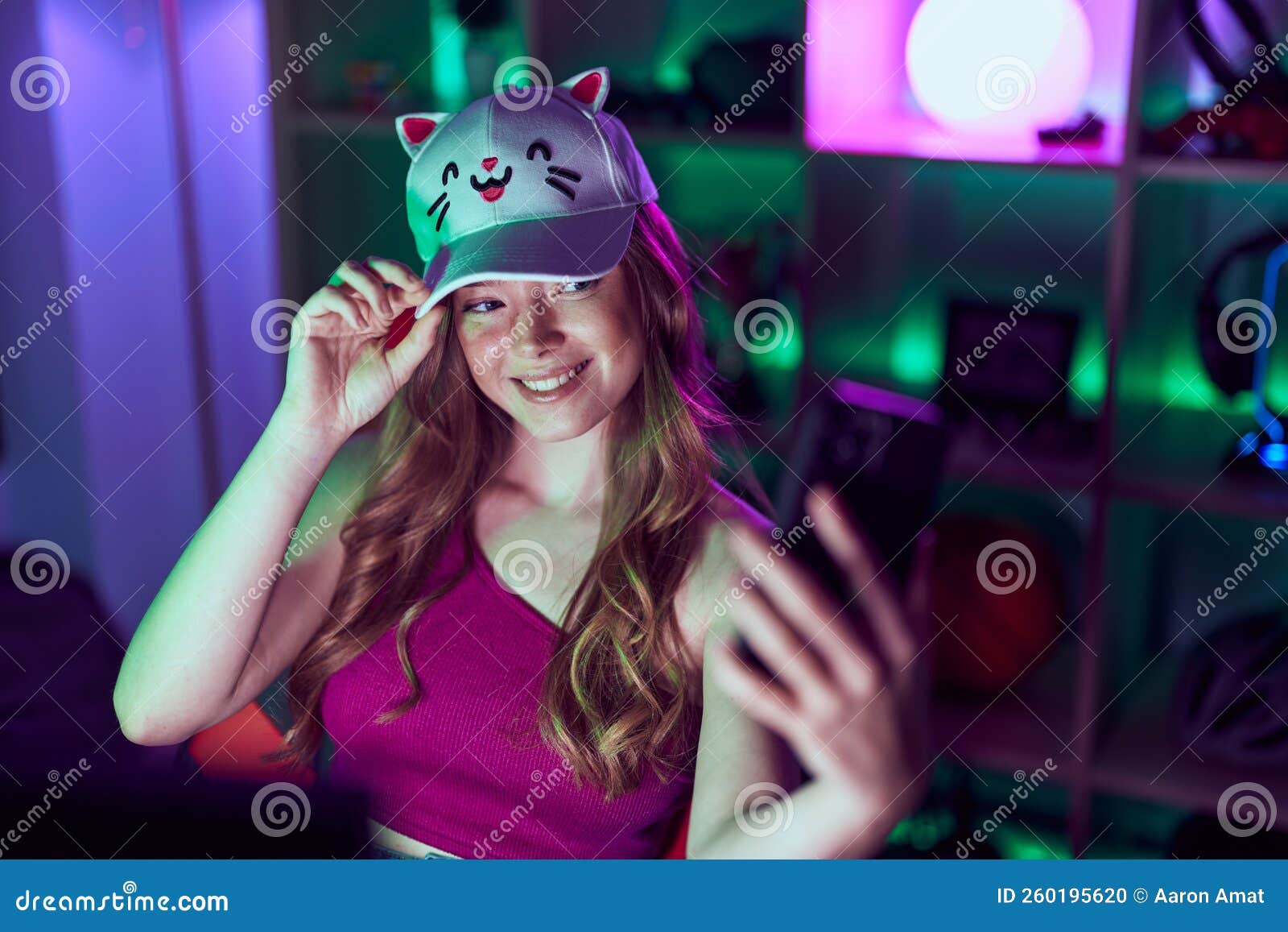 Young Woman Streamer Using Computer Make Selfie by Smarpthone at Gaming ...