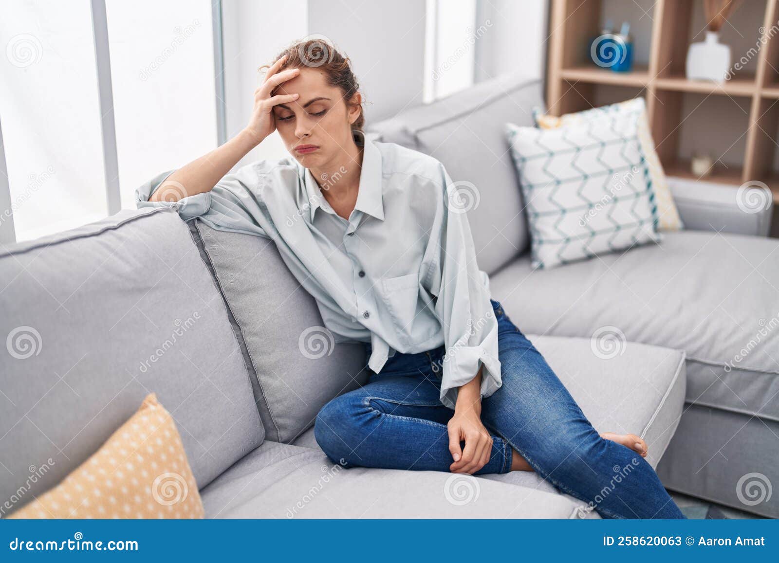 Young Woman Stressed Sitting on Sofa at Home Stock Image - Image of ...