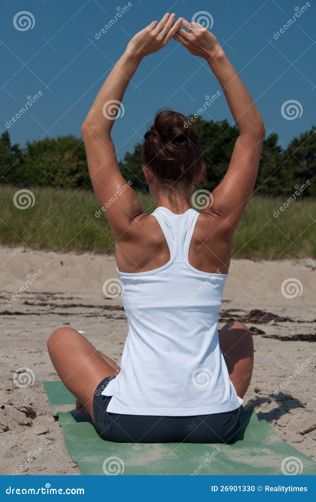 Young Woman Stretching on Beach Stock Photo - Image of outdoors ...