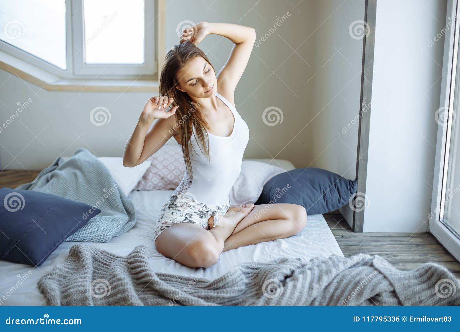Young Woman Stretching on Bed in Morning Stock Photo - Image of life ... Young Woman Stretching on Bed in Morning Stock Photo - Image of life ...