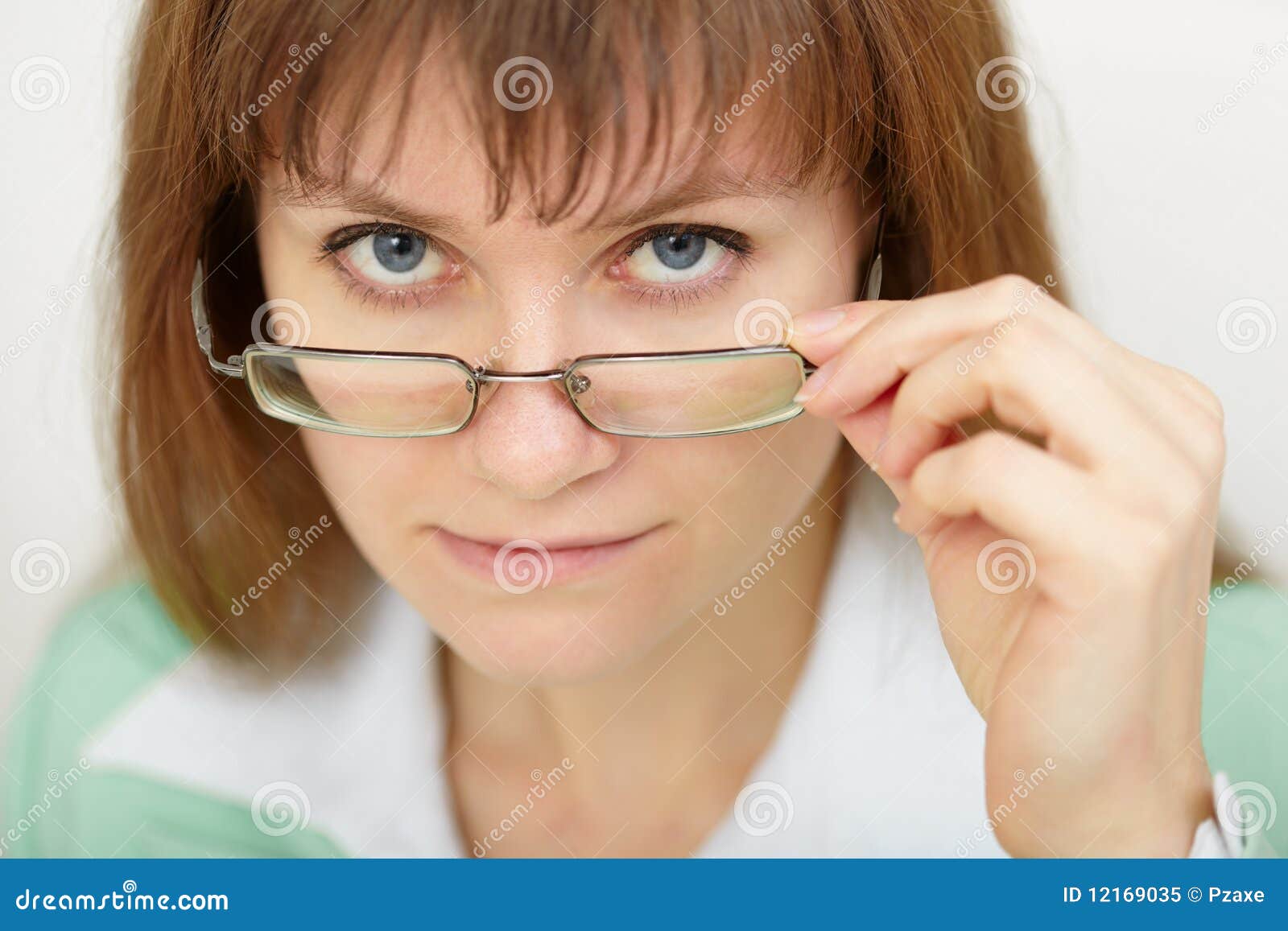 Young Woman Strictly Looks Over Spectacles Stock Image - Image of model ...