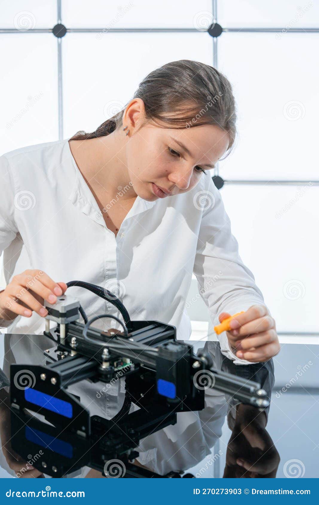 Young Woman Student Assembling Electronic Devices in the Robotics ...